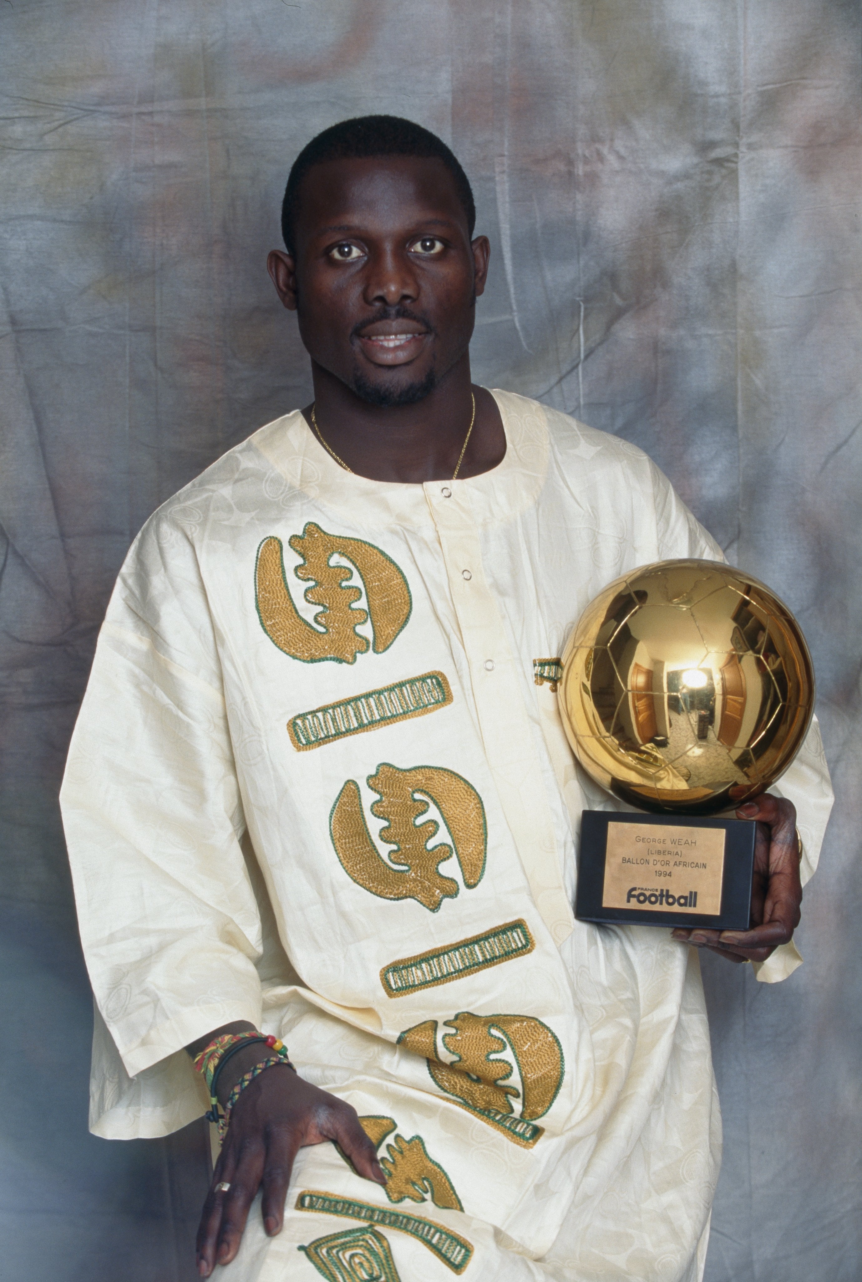 Liberian George Weah poses with the Ballon d'Or, regarded as football’s ...
