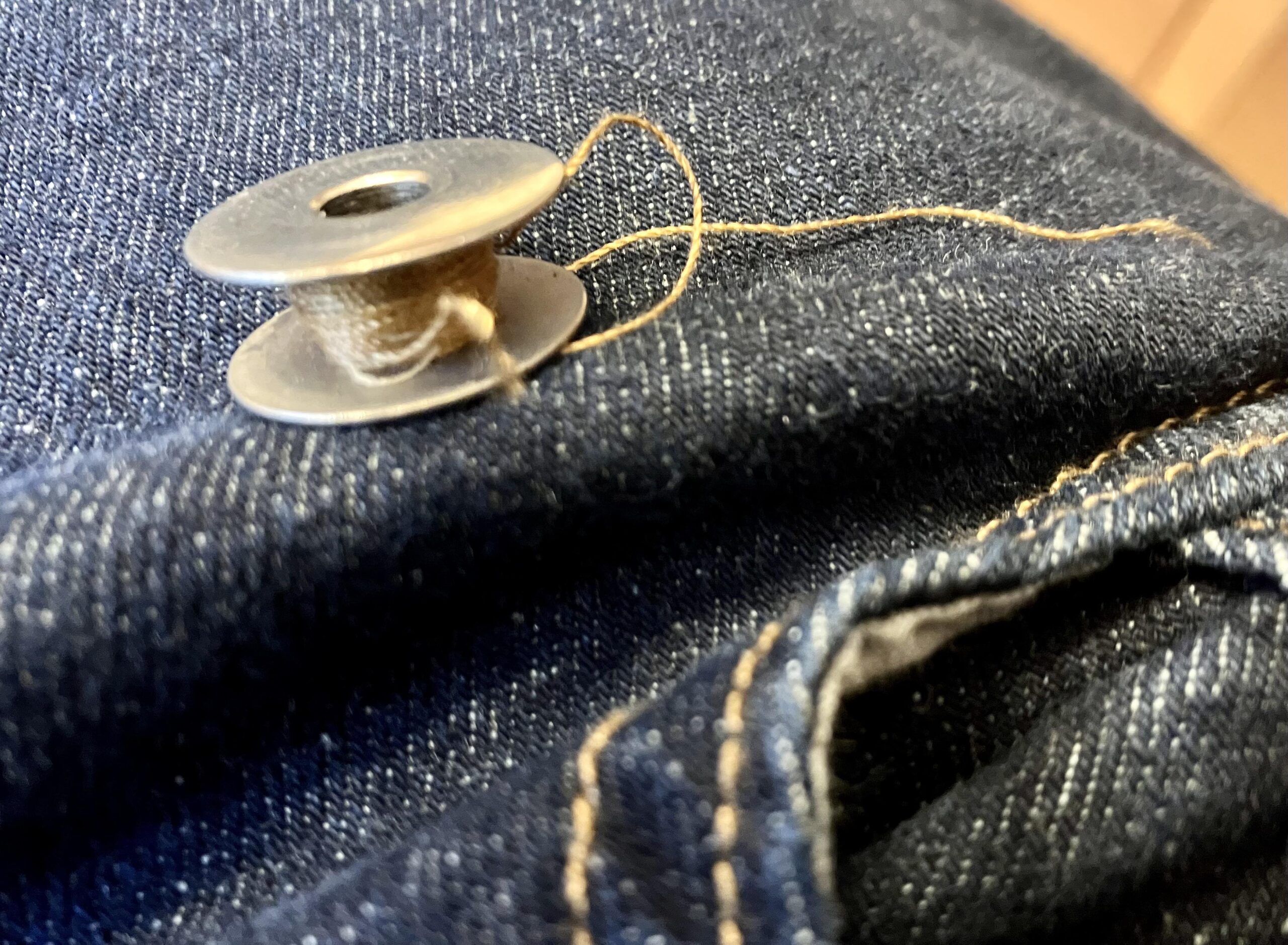 This tiny spool of thread was in the pocket of my new jeans - USLUCK