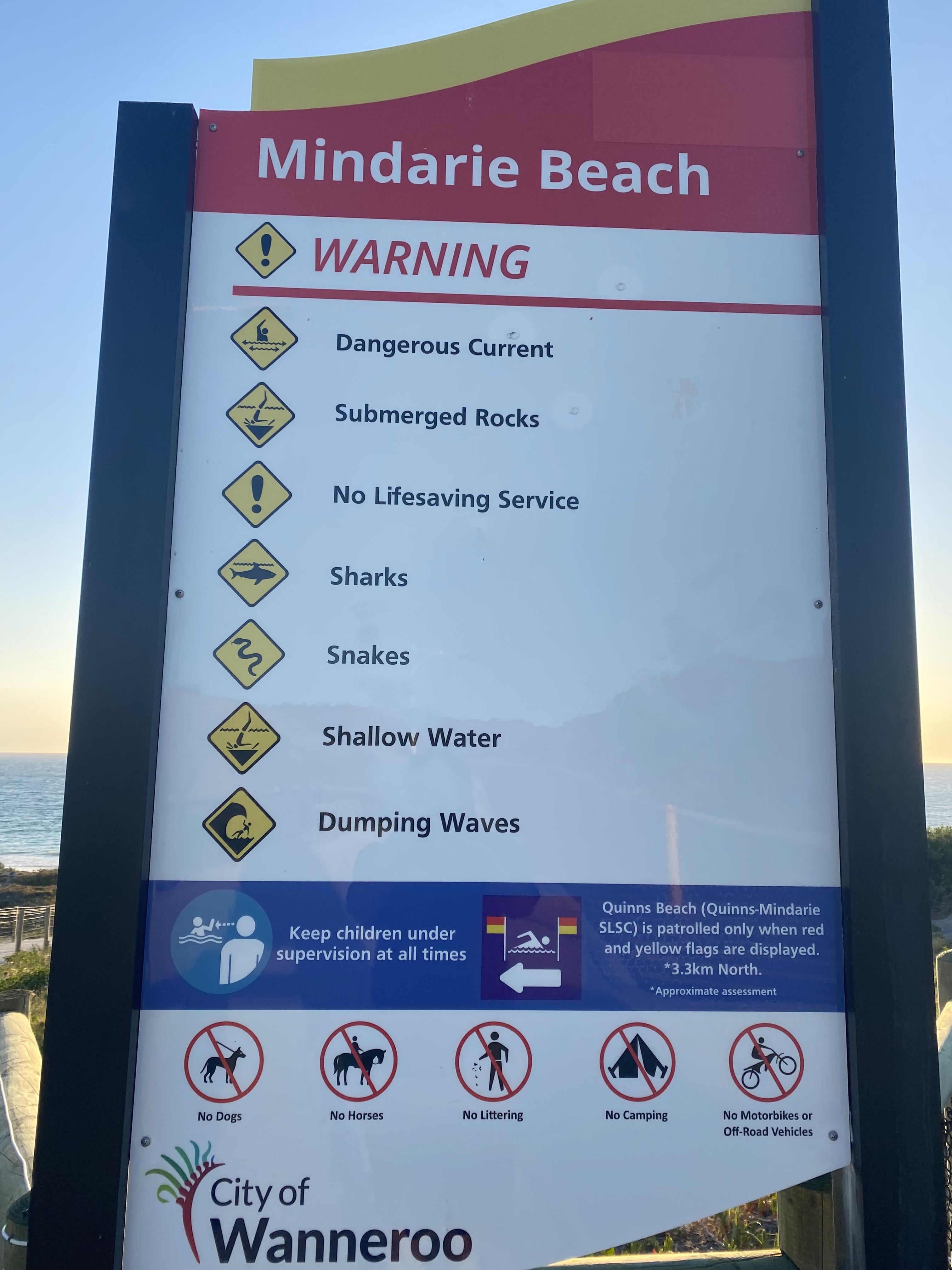 the warnings on an australian beach - USLUCK