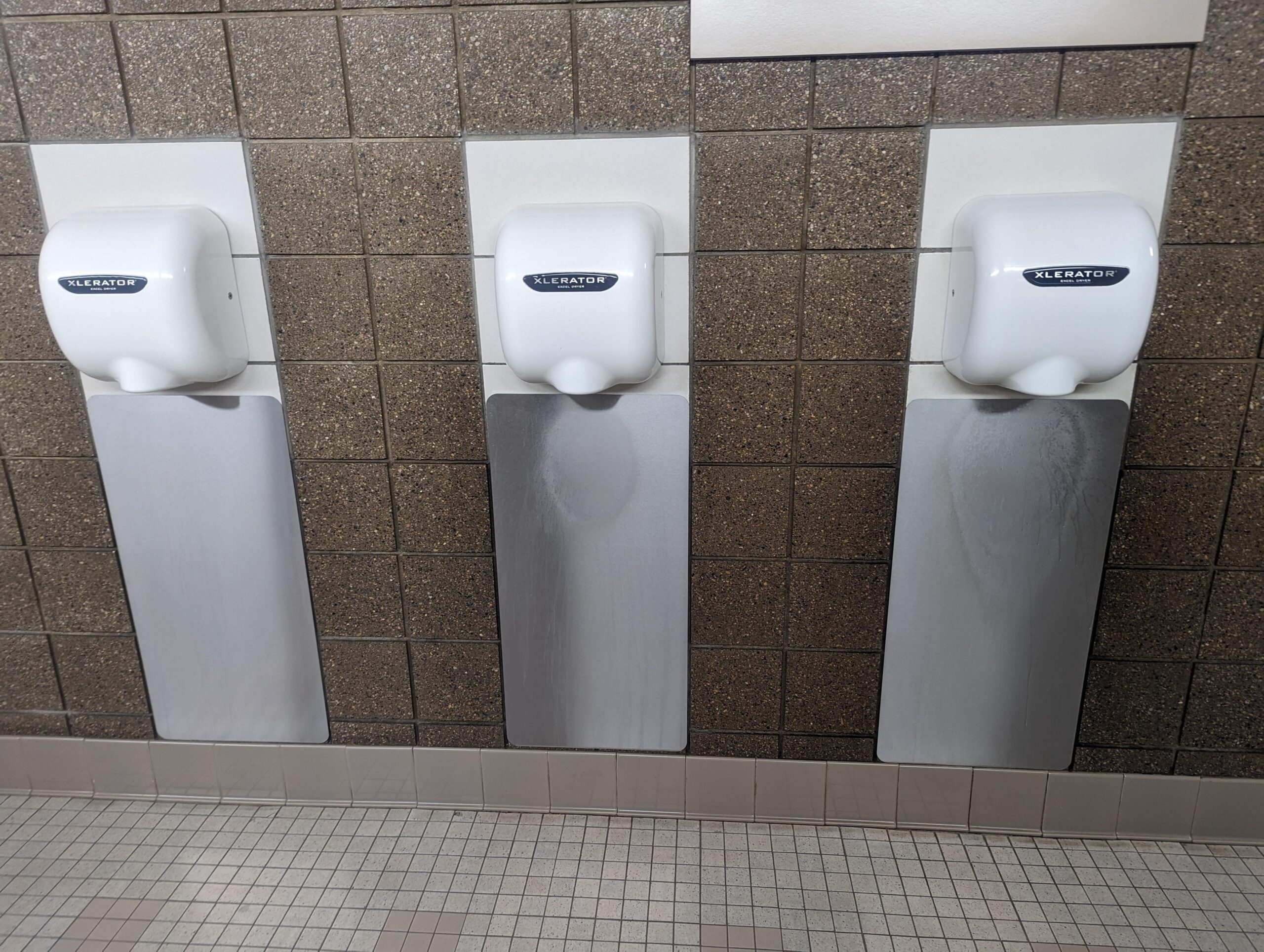 You can tell which hand dryer is used most based on the wall panels ...
