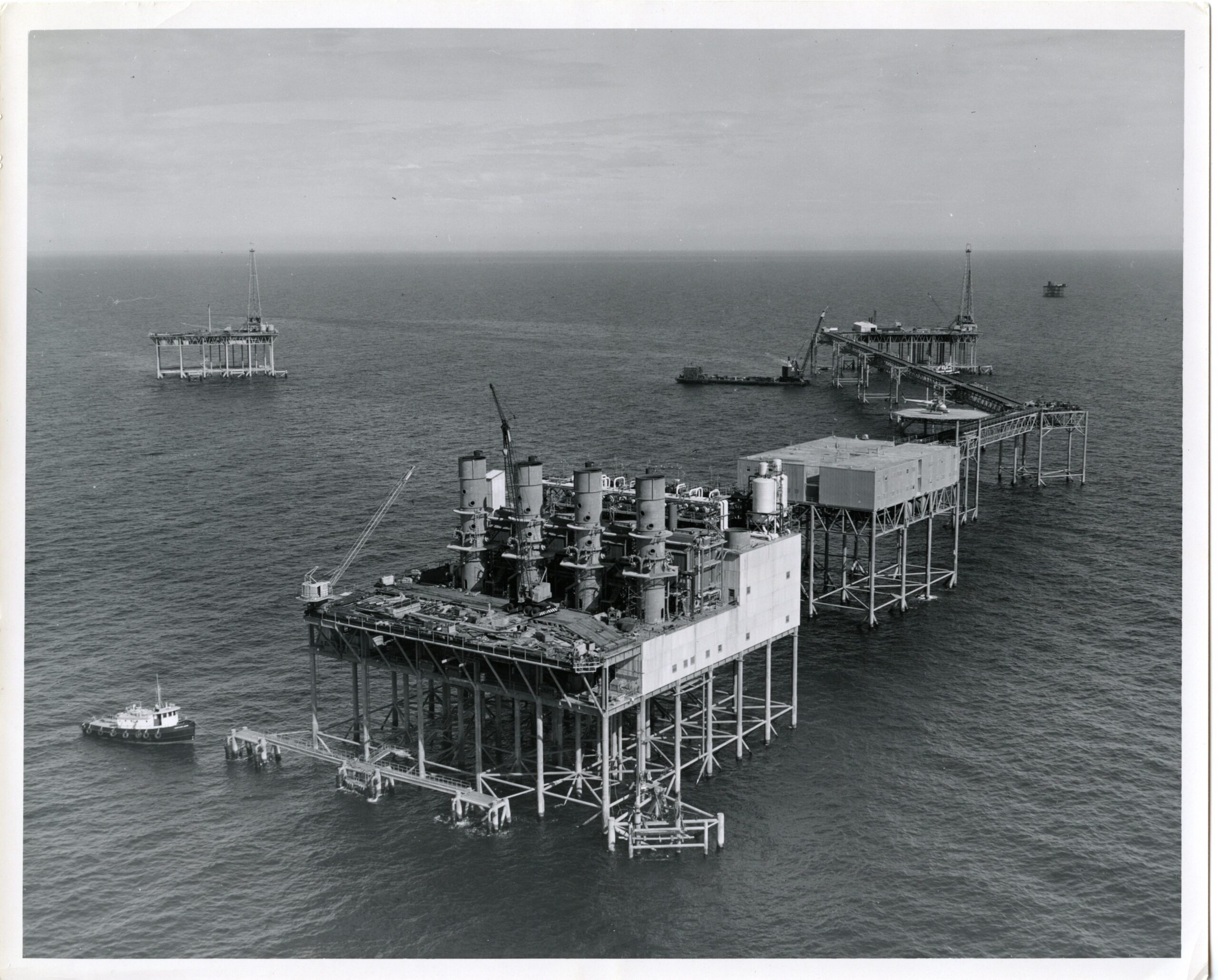 Off shore platform and one under construction in Gulf of Mexico off ...