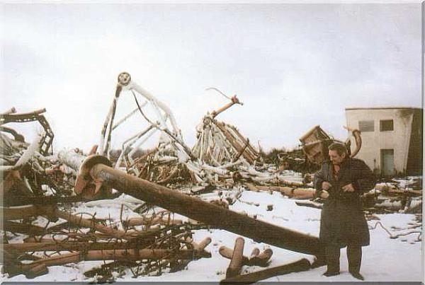 A man looking at the remains of a Warsaw radio mast. An accident while ...