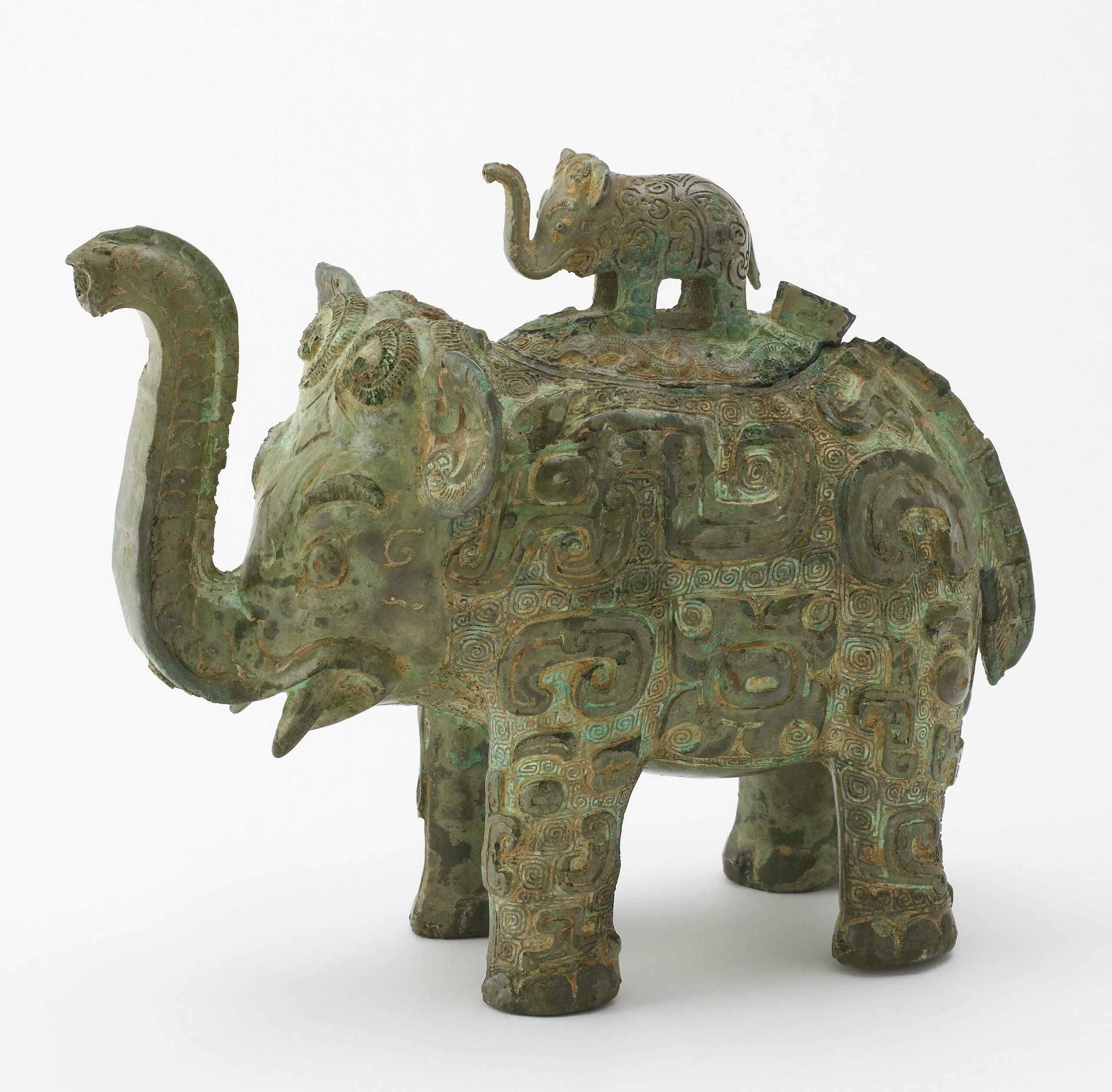 3,000-year-old bronze vessel shaped like an elephant with smaller ...