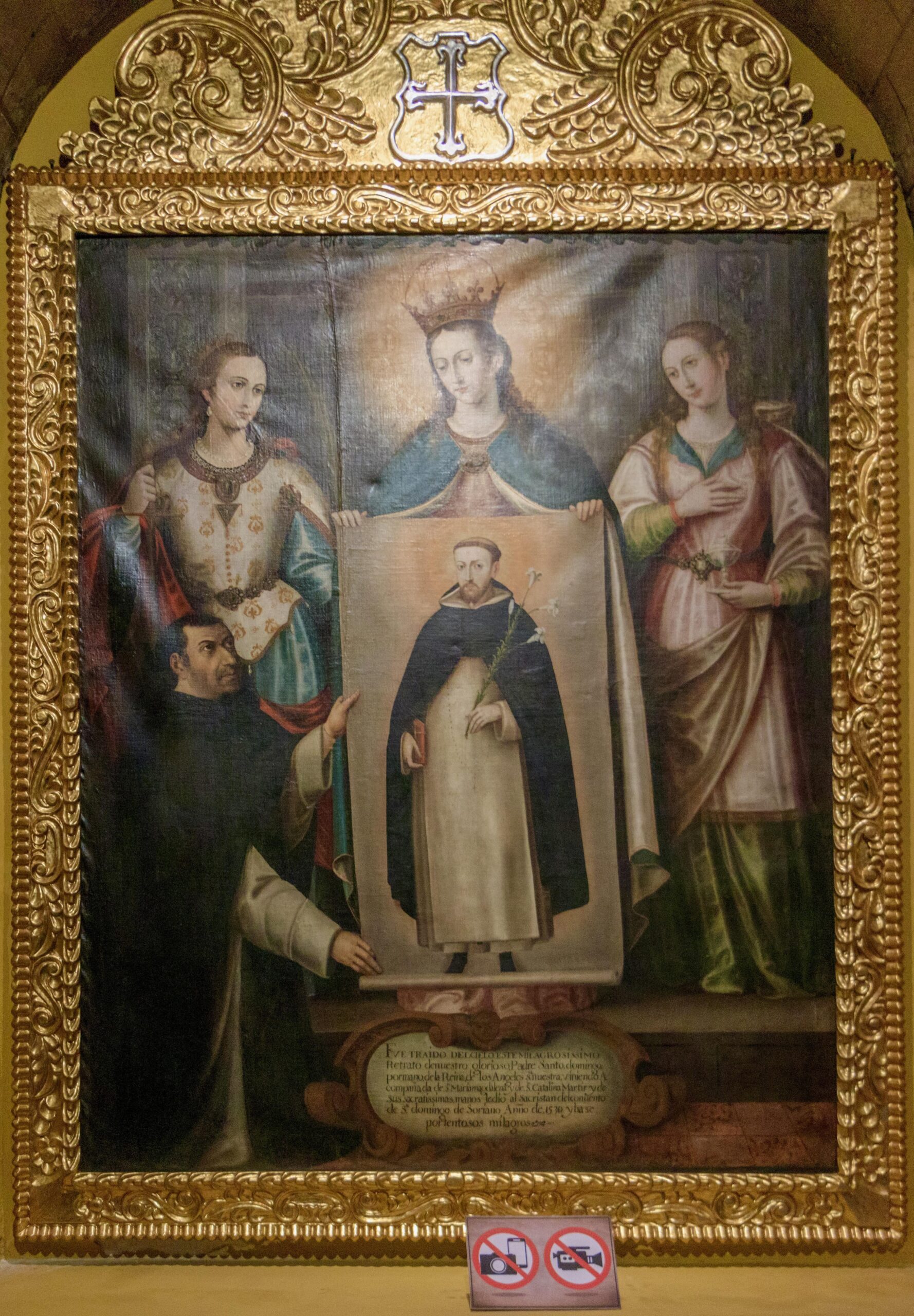 An unusual painting of Virgin Mary presenting a portrait of St. Dominic ...
