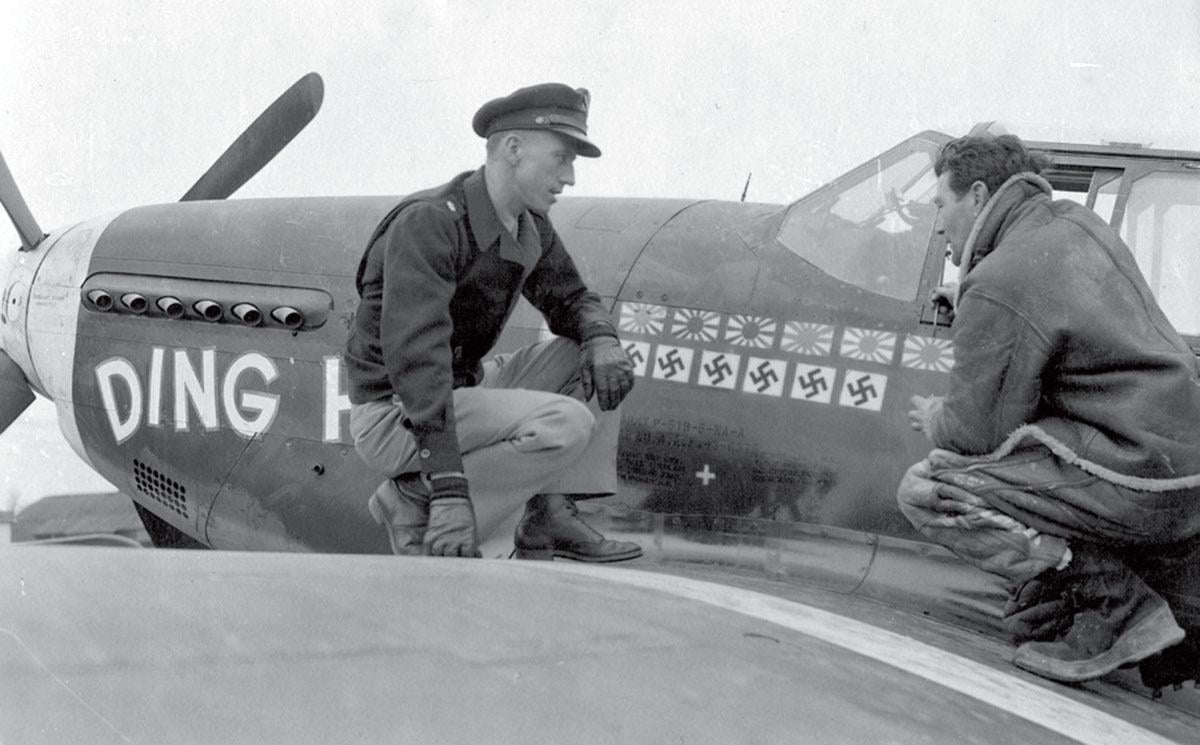 Major Jim Howard (Left) talks with his crew chief Ssgt M. P. Price ...
