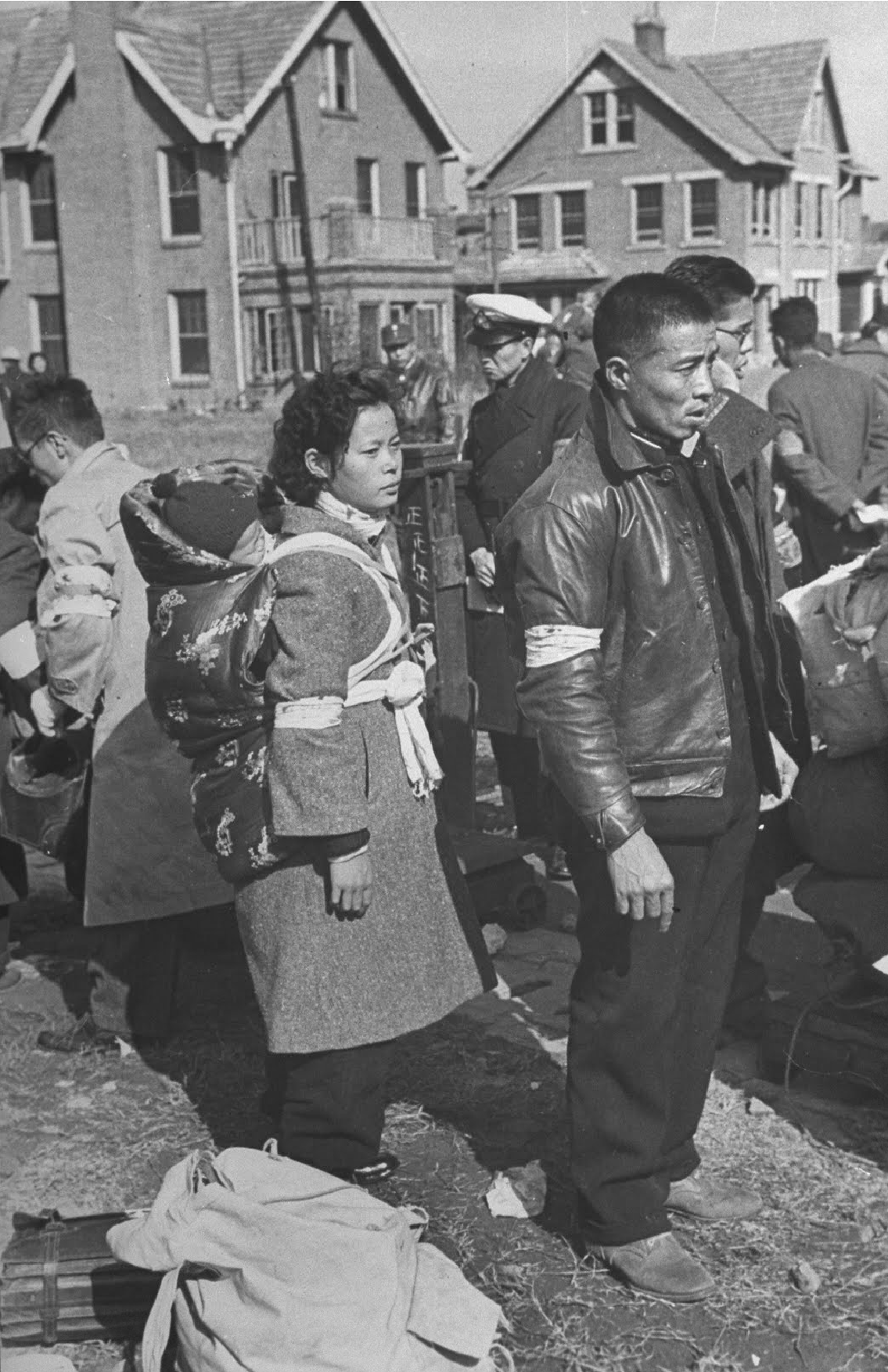 Japanese citizens waiting for examination of their luggage and clothing ...