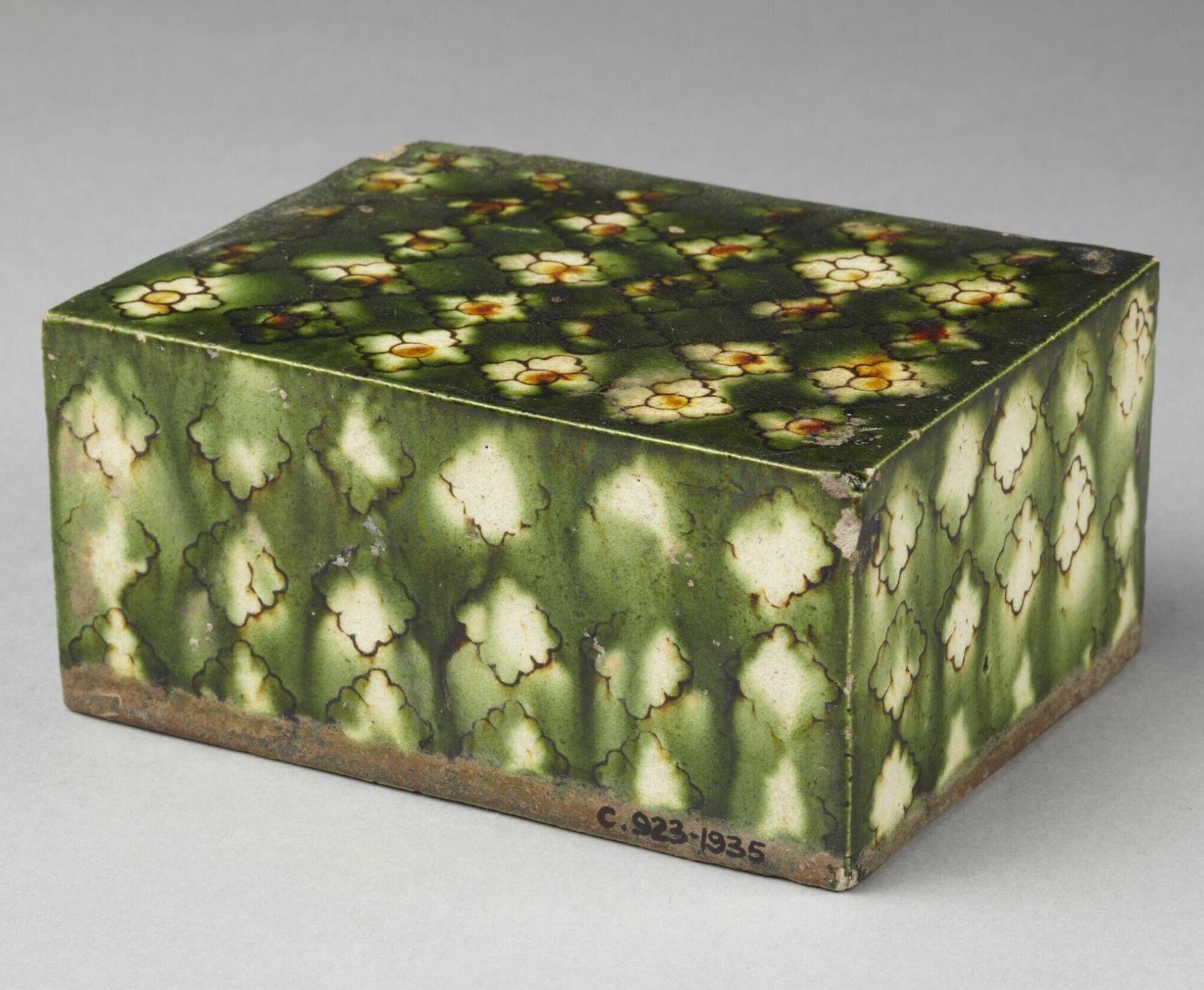 Ceramic wrist rest with green glaze. China, Tang dynasty, 8th century ...